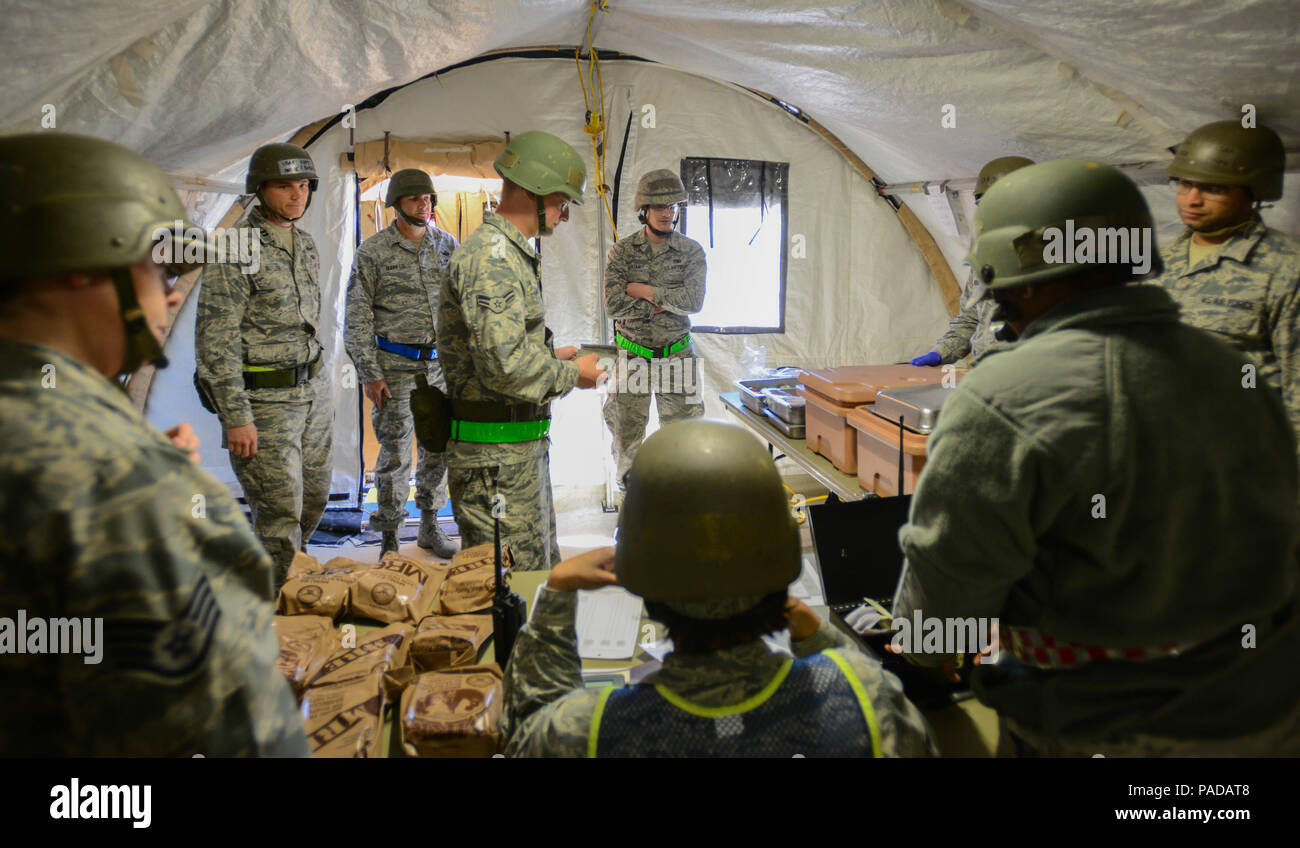 U.S. Airmen visit the field kitchen during operational readiness ...