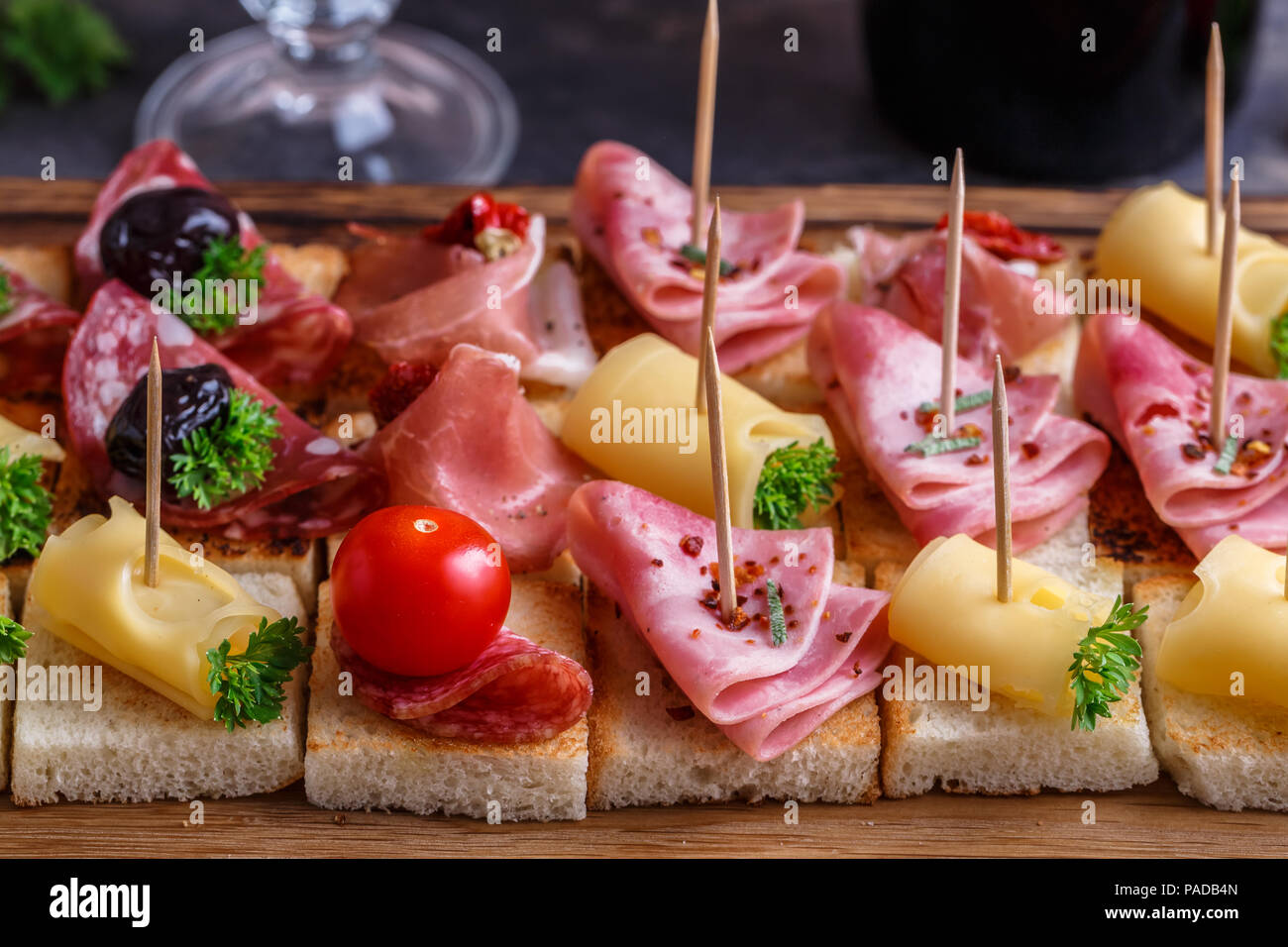 Close view pintxos, tapas, spanish canapes party finger food Stock ...