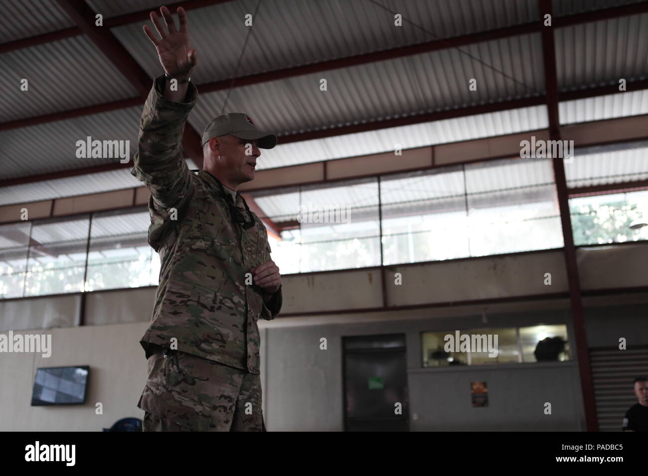 U.S. Army Ltc. Durrell Martin with Task Force Red Wolf gives a brief to ...