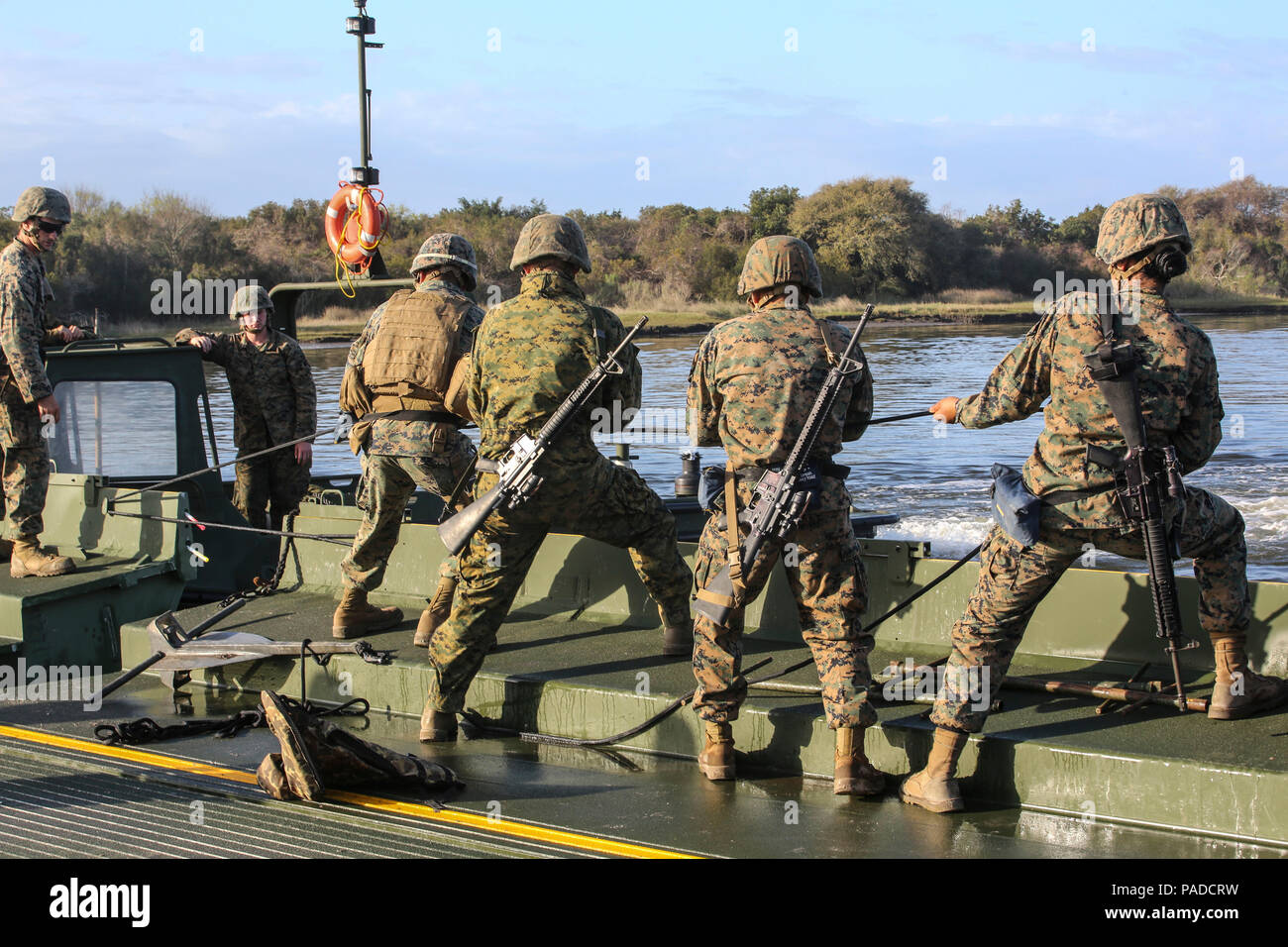 Marines with Bridge Company, 8th Engineer Support Battalion pull a ...