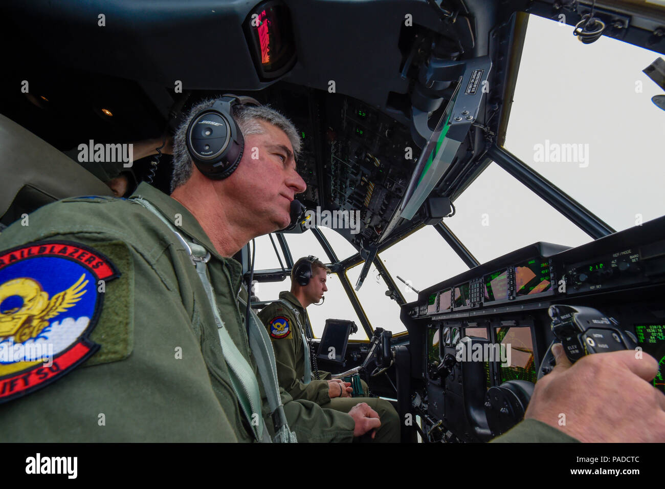 .S. Air Force Lt. Gen. Sam Cox, 18th Air Force commander, flies a C ...