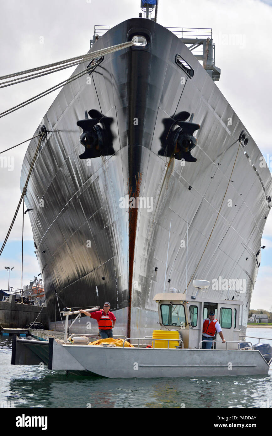Large Ship Small Boat Stock Photo - Alamy