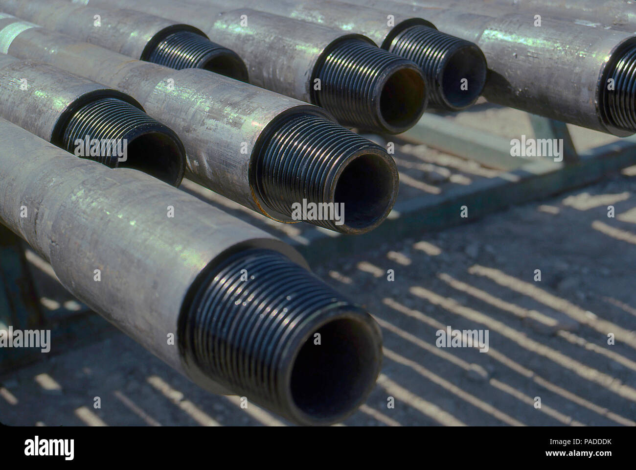 Oil well drill pipe Stock Photo - Alamy