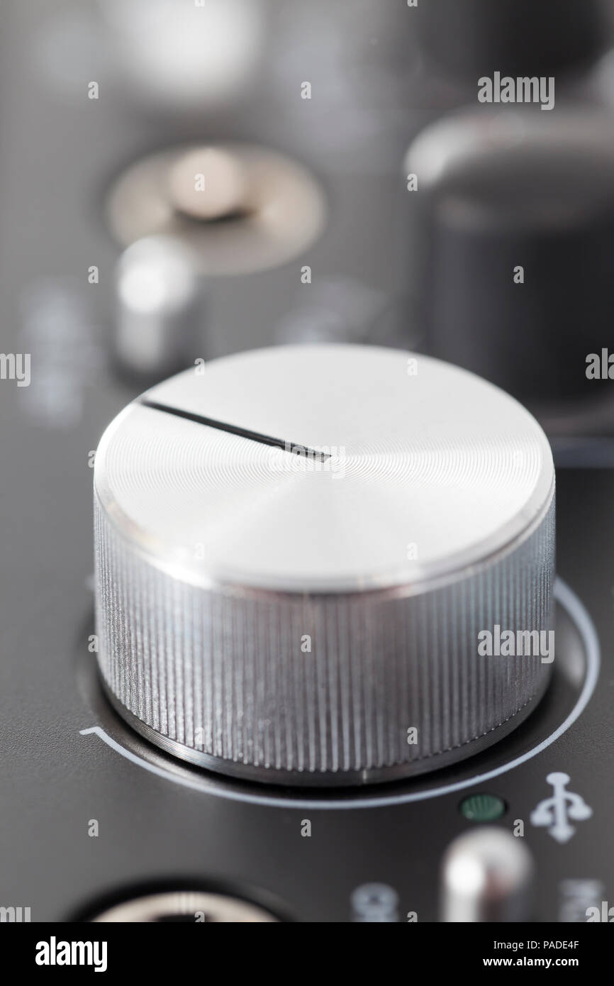 Metal or plastic as a metal lever of volume control on musical ...