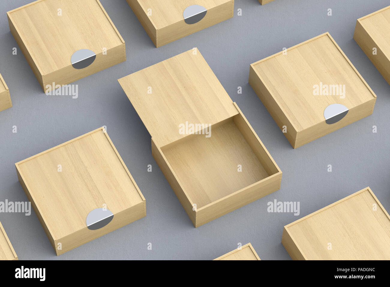 Empty light wooden square box with opened sliding lid with closed boxes ...