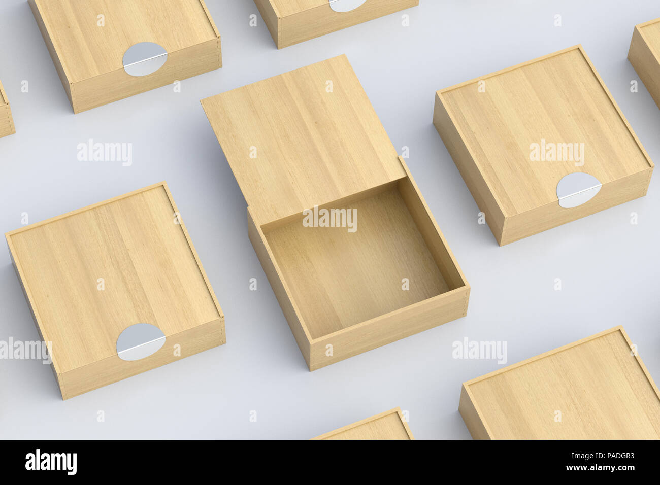 Empty light wooden square box with opened sliding lid with closed boxes ...