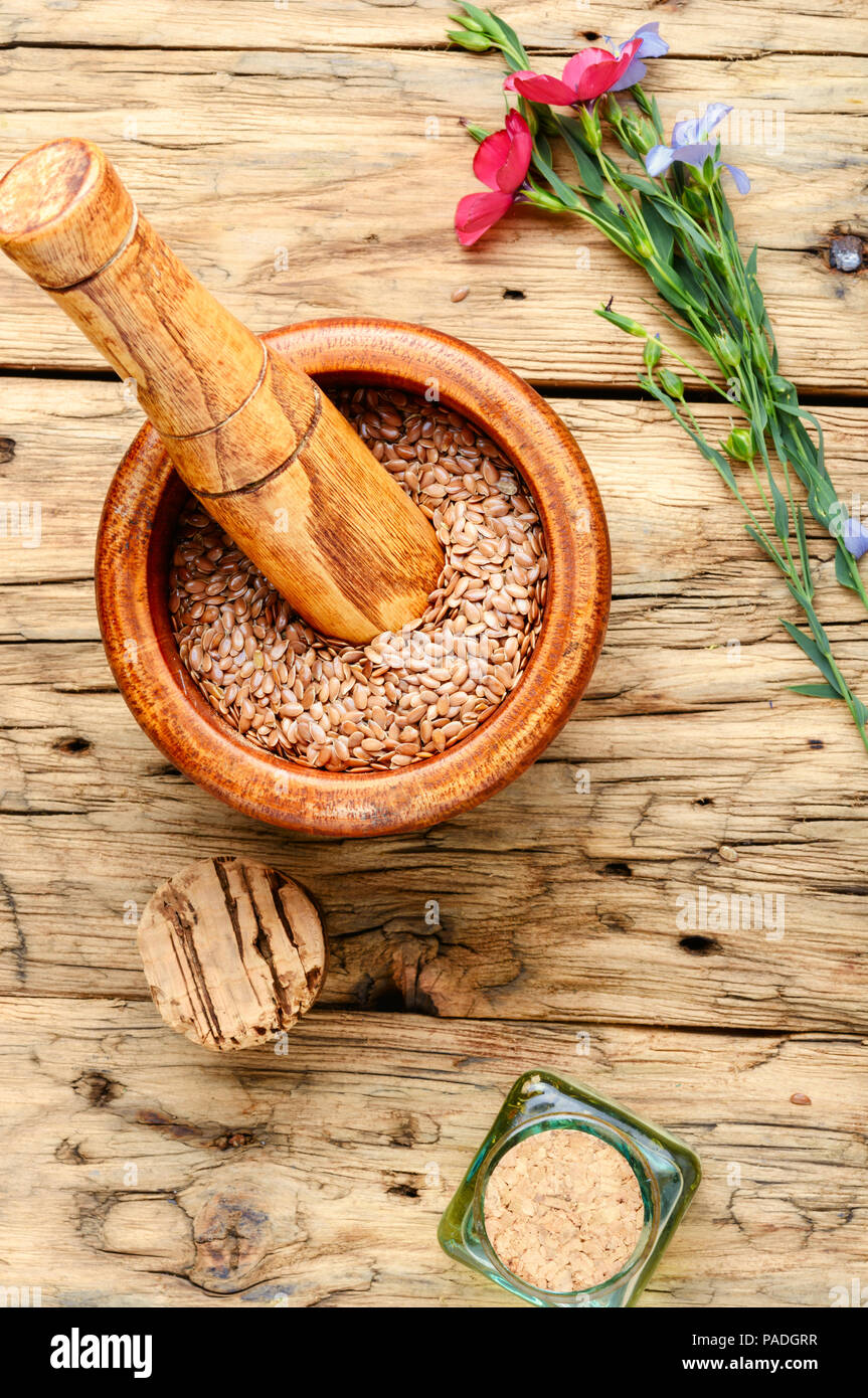 Flax seed,oil and flax flowers in mortar.Linseeds Stock Photo - Alamy
