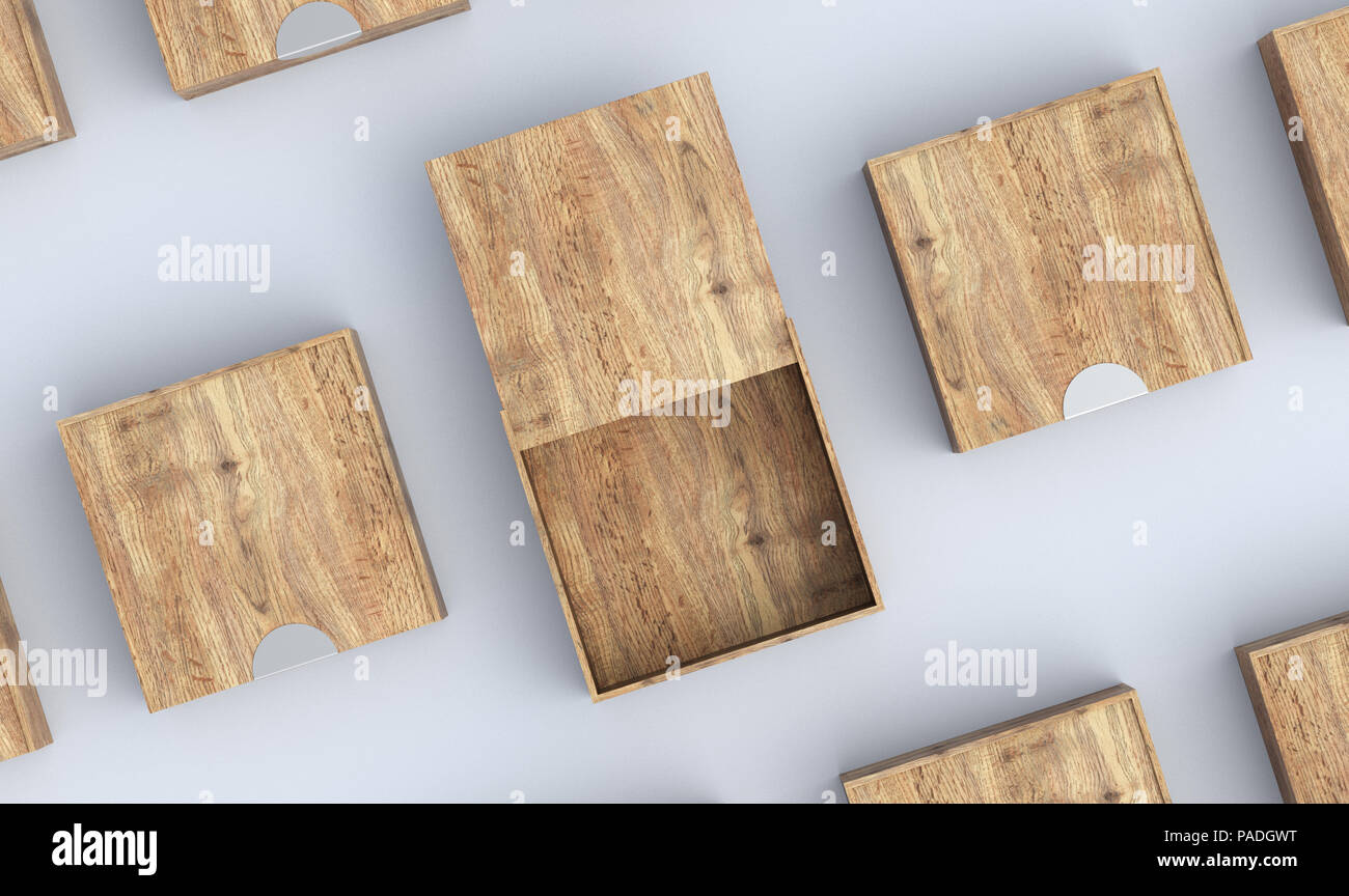 Empty wooden square box with opened sliding lid with closed boxes ...