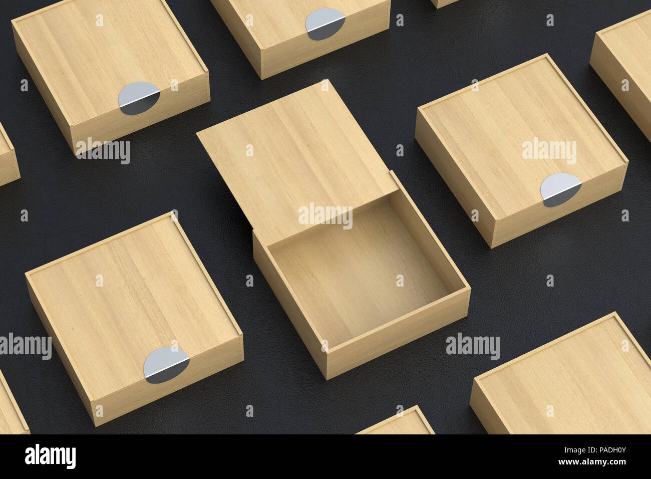 Empty light wooden square box with opened sliding lid with closed boxes ...