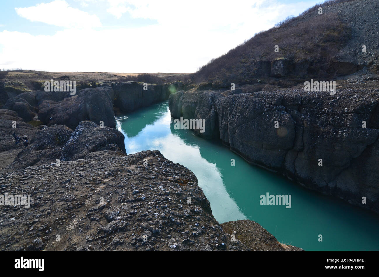 Giant rock formations with a river running through them Stock Photo - Alamy
