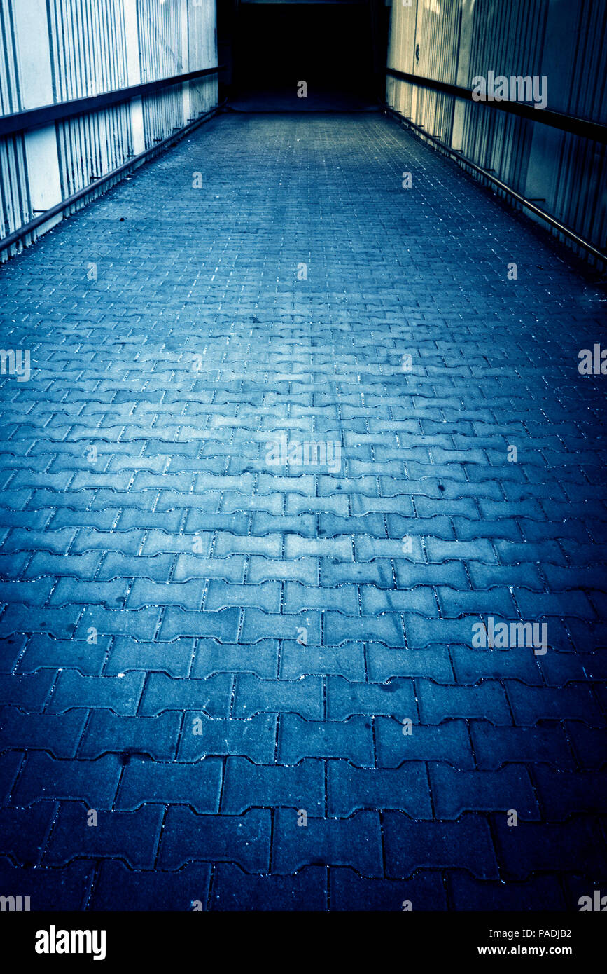 descending path to an urban underpass or tunnel Stock Photo - Alamy