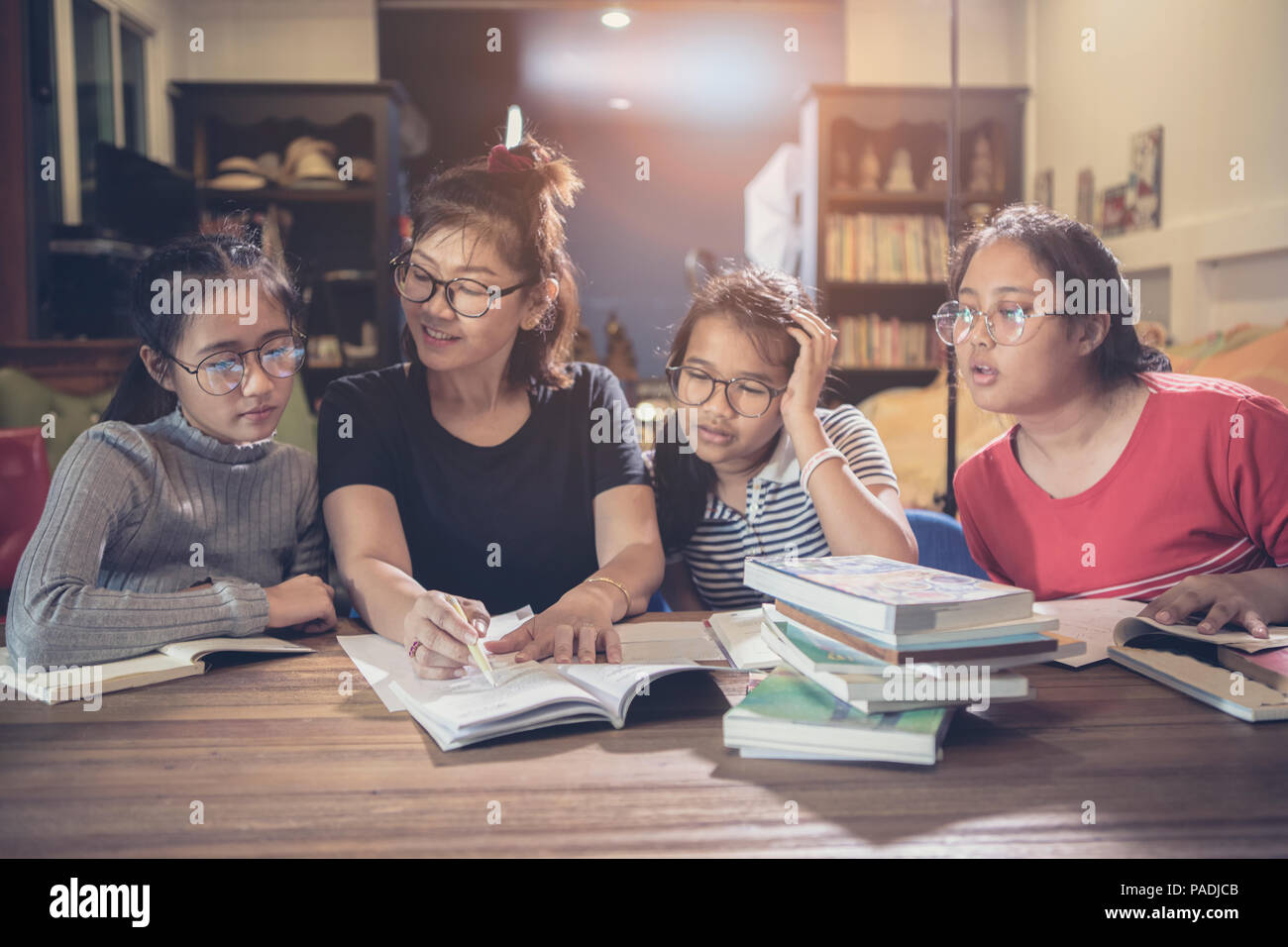 asian student and teacher explain study case in modern class room Stock ...