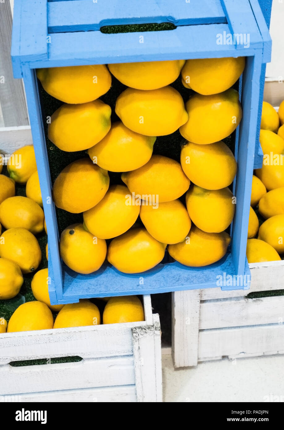 Healthy organic lemons in blue and white boxes on the floor Stock Photo ...