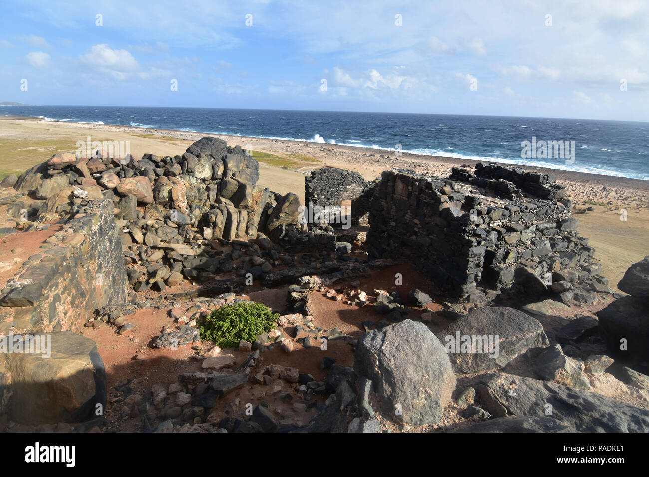 Ancient gold mine ruins on the beach of Aruba Stock Photo - Alamy