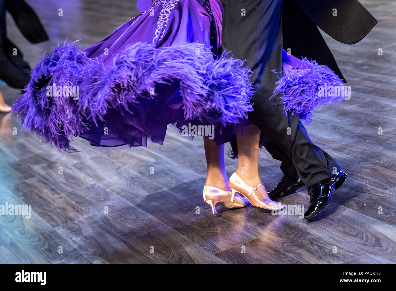 Legs of young dancers on the dance floor Stock Photo - Alamy