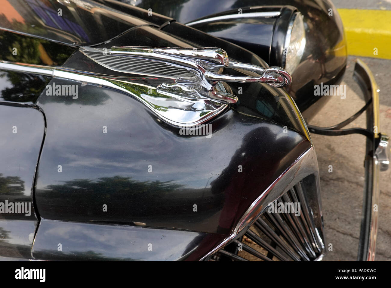 The hood ornament of a 1930's Packard Twelve Sedan as viewed from above ...