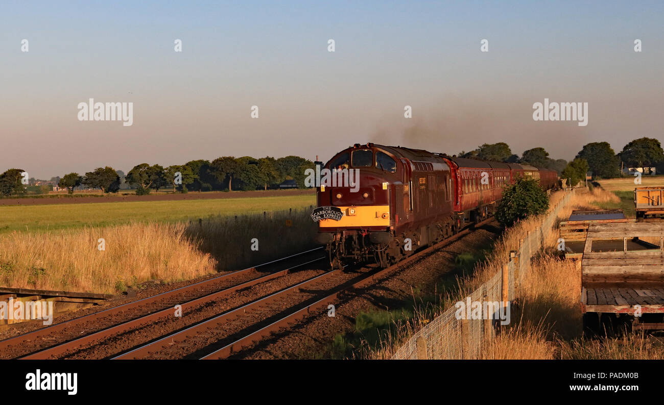 West Coast Railways diesel loco 37669 approaches Hoscar station early ...