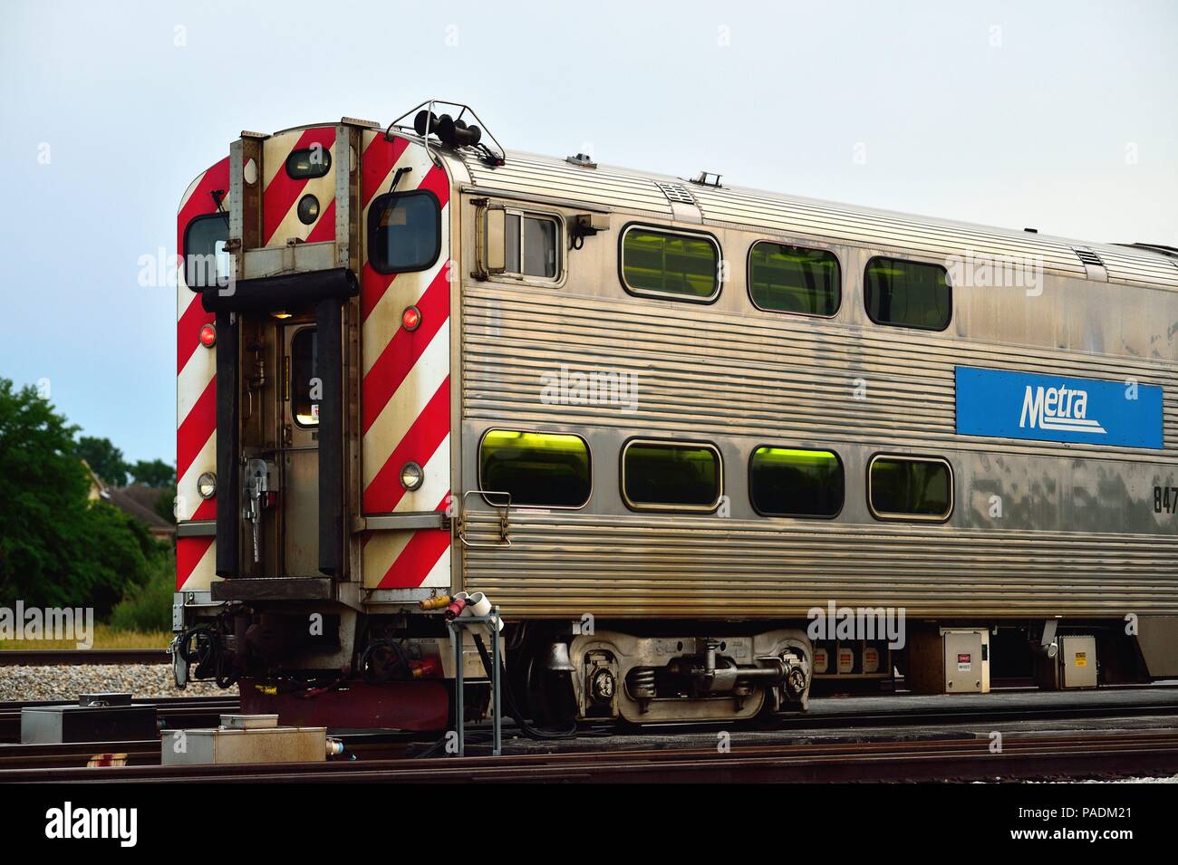 Orland Park, Illinois, USA. Metra commuter train sitting on a ready ...