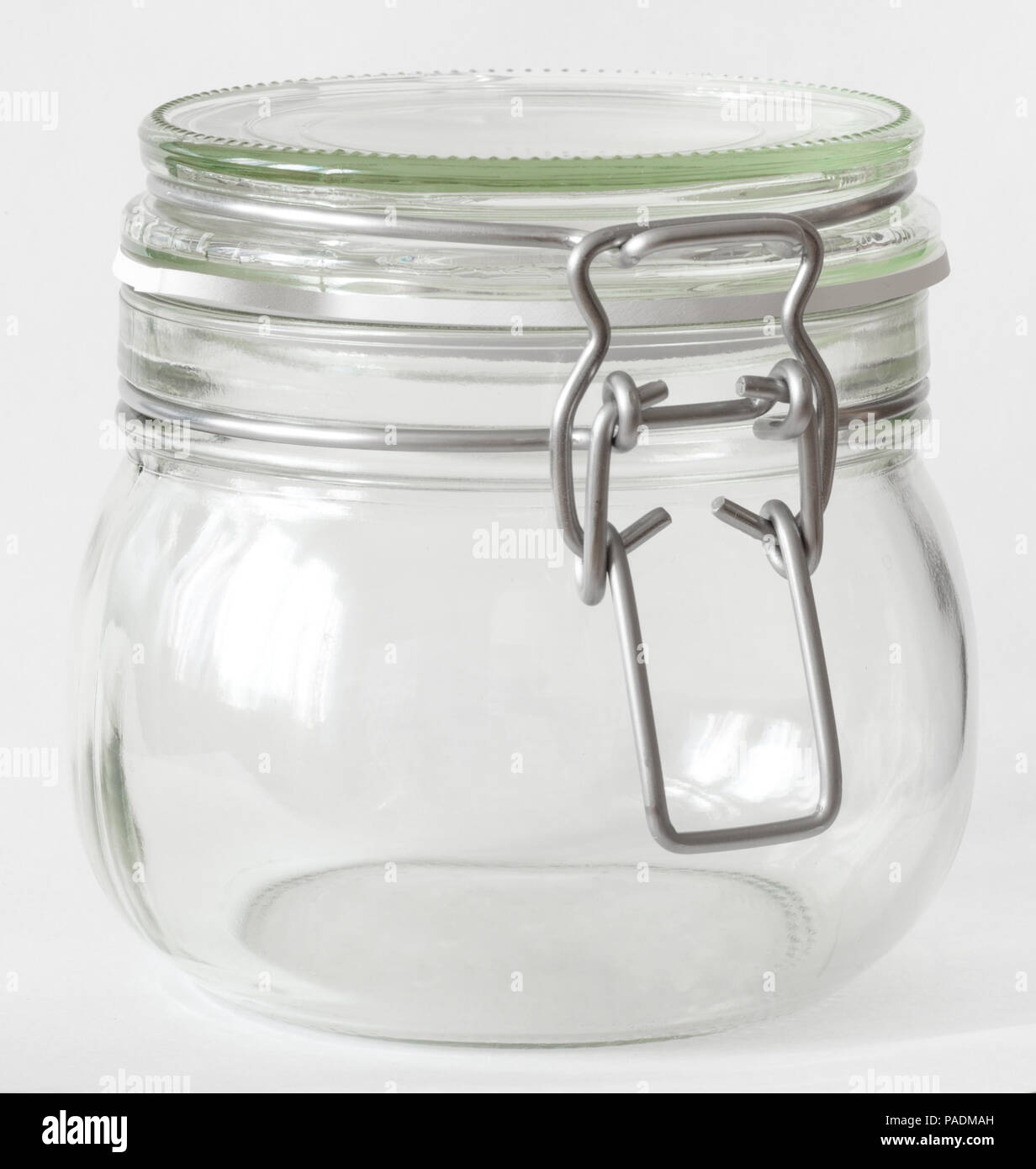 Glass jar with lid isolated on white Stock Photo - Alamy