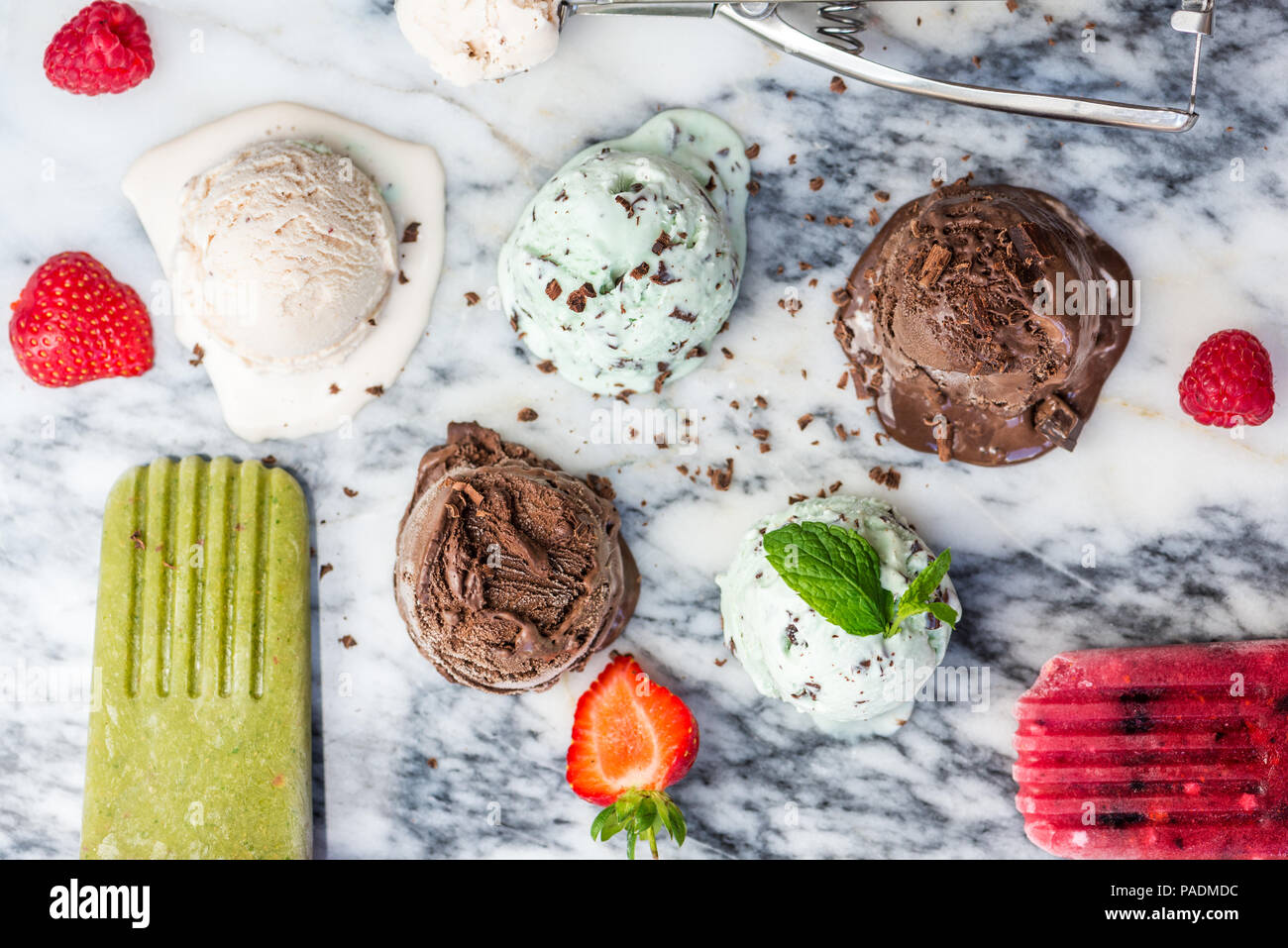 Selection of different ice cream scoops such as mint, chocolate and ...