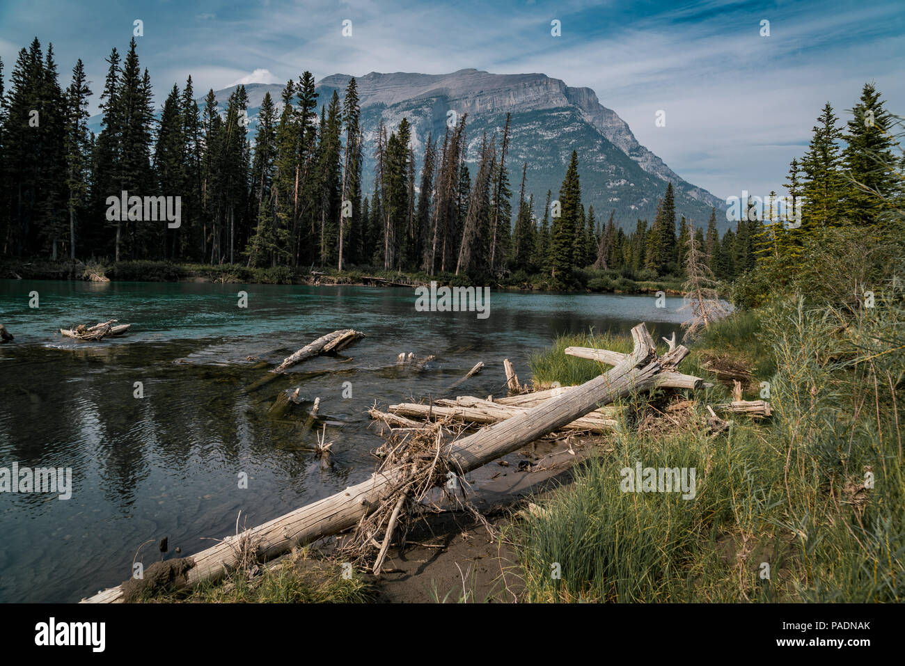 Scenic sunset views over bow river three sisters, Banff National Park ...