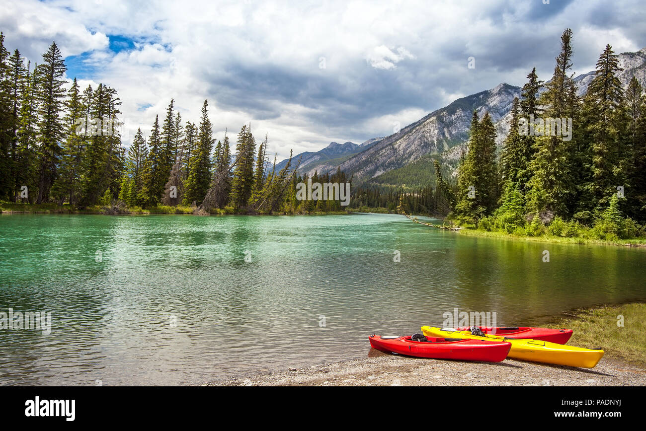 Canoes at the Bow River in Banff National Park Alberta Canada Stock ...