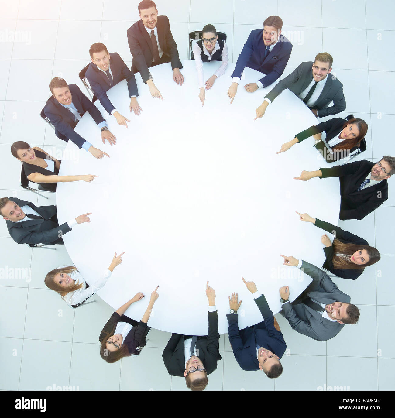 group of business people sitting at the round table. the business ...