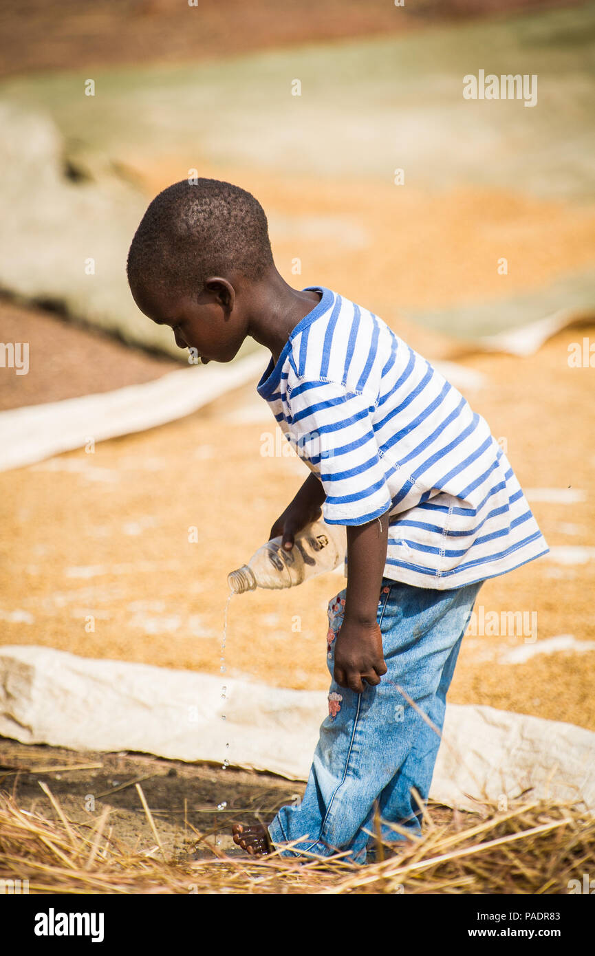 ACCRA, GHANA - MARCH 6, 2012: Unidentified Ghanaian boy in the street ...