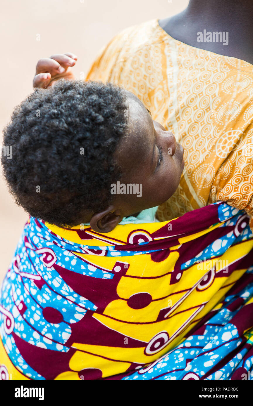 ACCRA, GHANA - MARCH 6, 2012: Unidentified Ghanaian little baby on his ...