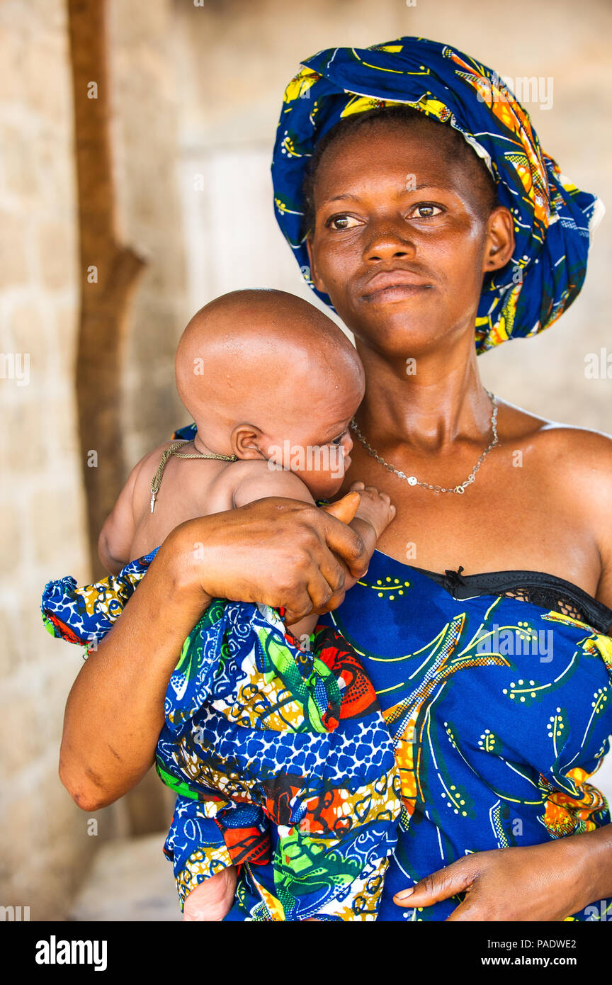 PORTO-NOVO, BENIN - MAR 9, 2012: Unidentified Beninese loving mother ...