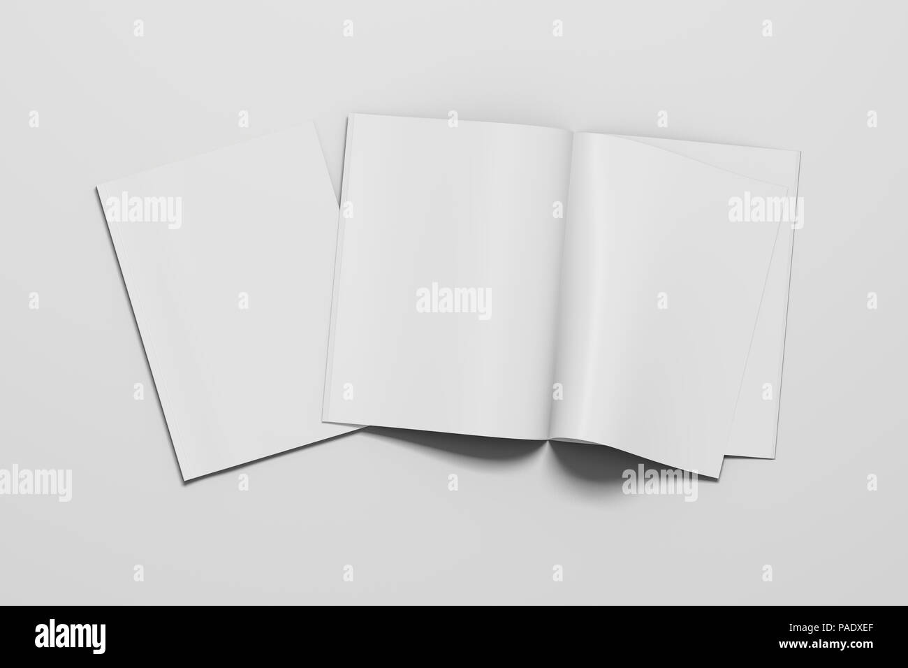 Blank magazine pages with bent glossy paper and blank cover on white ...