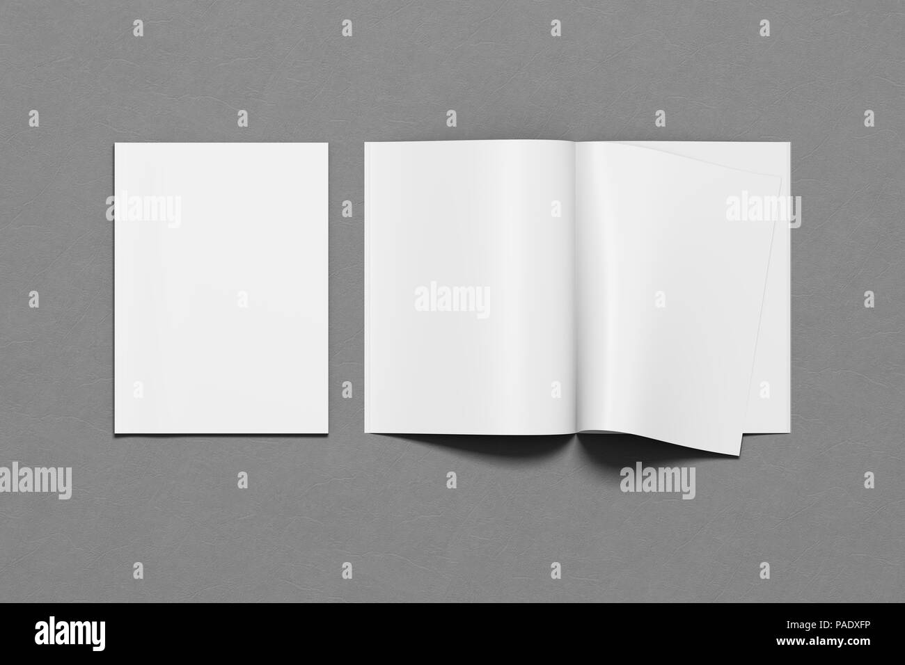 Blank magazine pages with bent glossy paper and blank cover on gray ...