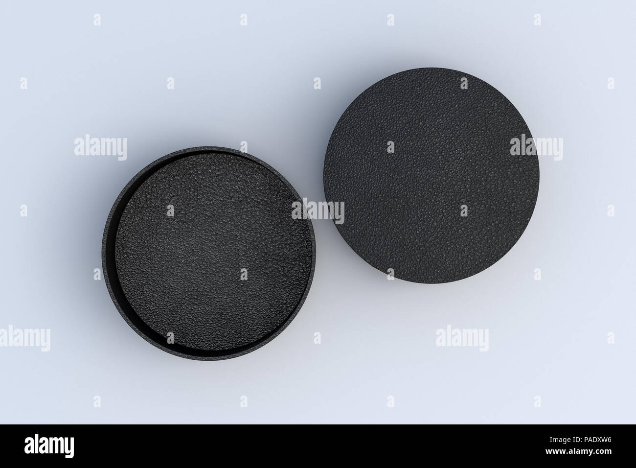 Two black leather round boxes opened and closed on white background. 3d ...