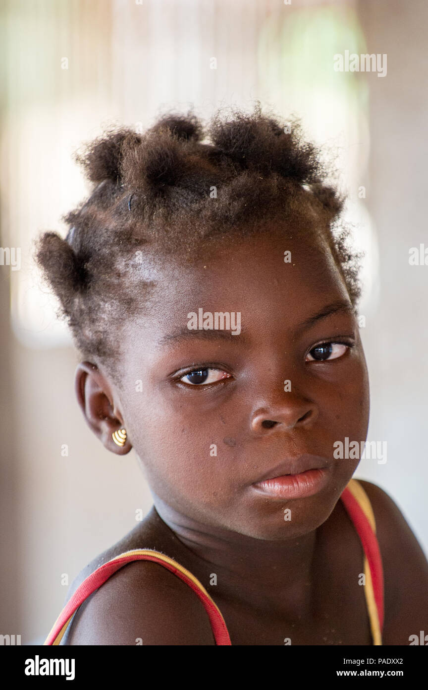 PORTO-NOVO, BENIN - MAR 10, 2012: Unidentified Beninese cute local girl ...