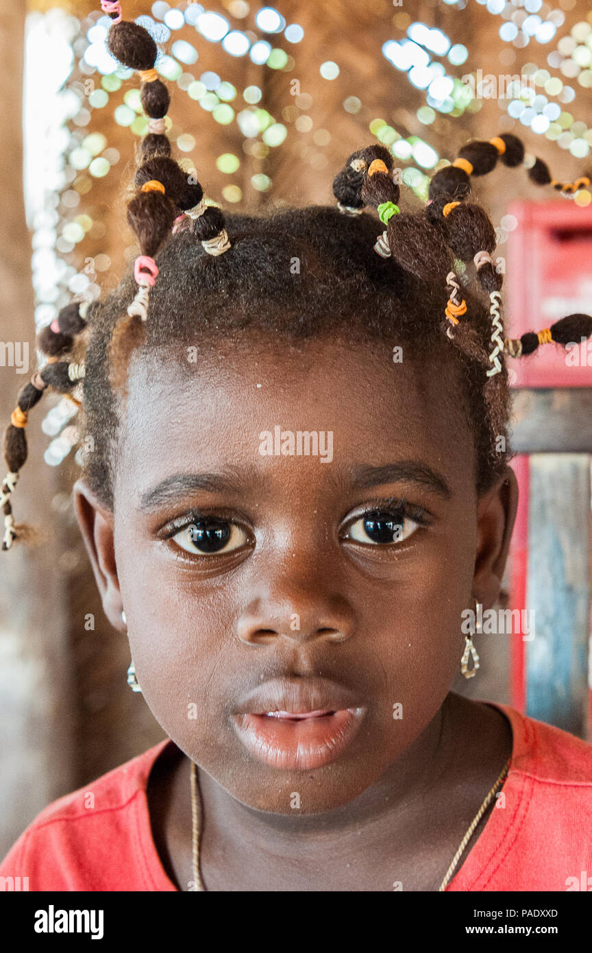 PORTO-NOVO, BENIN - MAR 10, 2012: Unidentified Beninese cute local girl ...