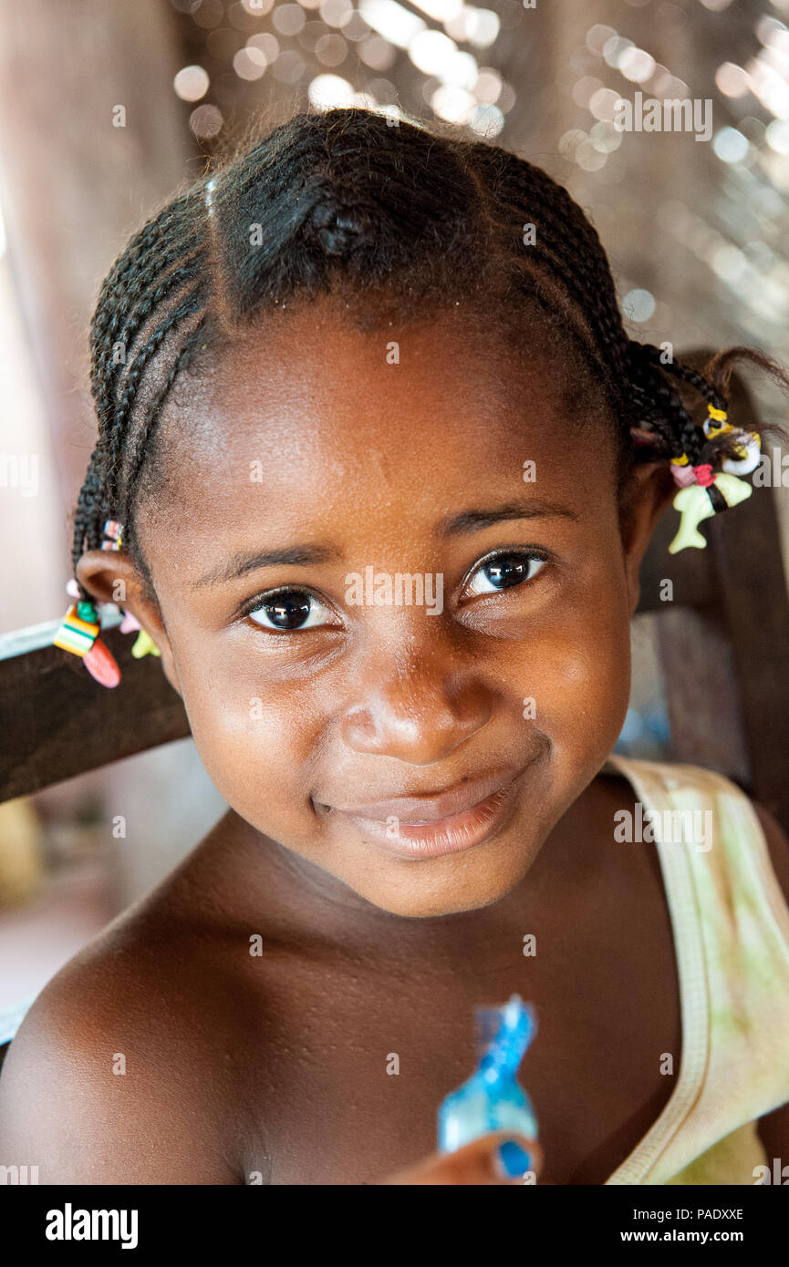 PORTO-NOVO, BENIN - MAR 10, 2012: Unidentified Beninese cute local girl ...