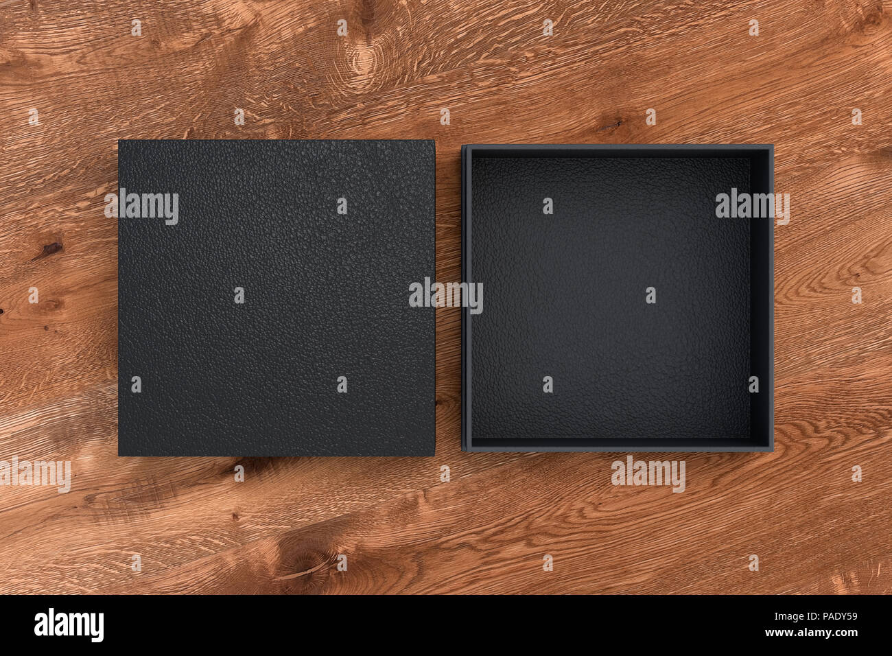 Two black leather square boxes opened and closed on wood background. 3d ...