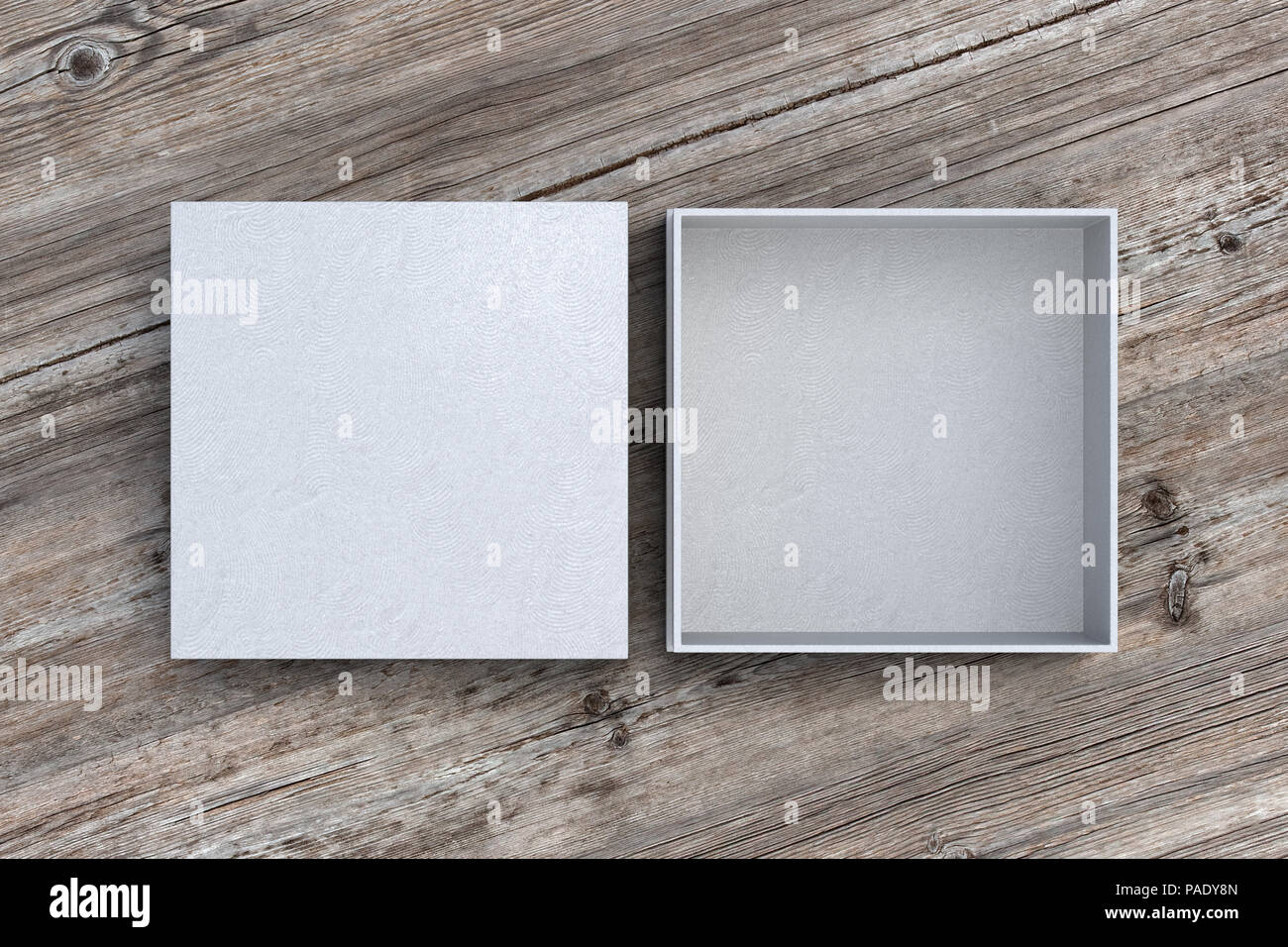 Two white square boxes opened and closed on wood background. 3d ...