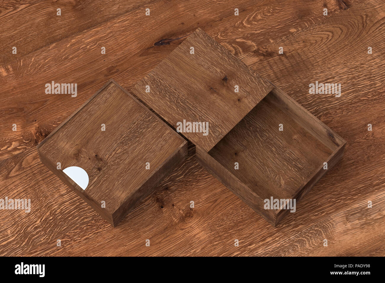 Two dark wooden square boxes with sliding lid on dark wooden background ...