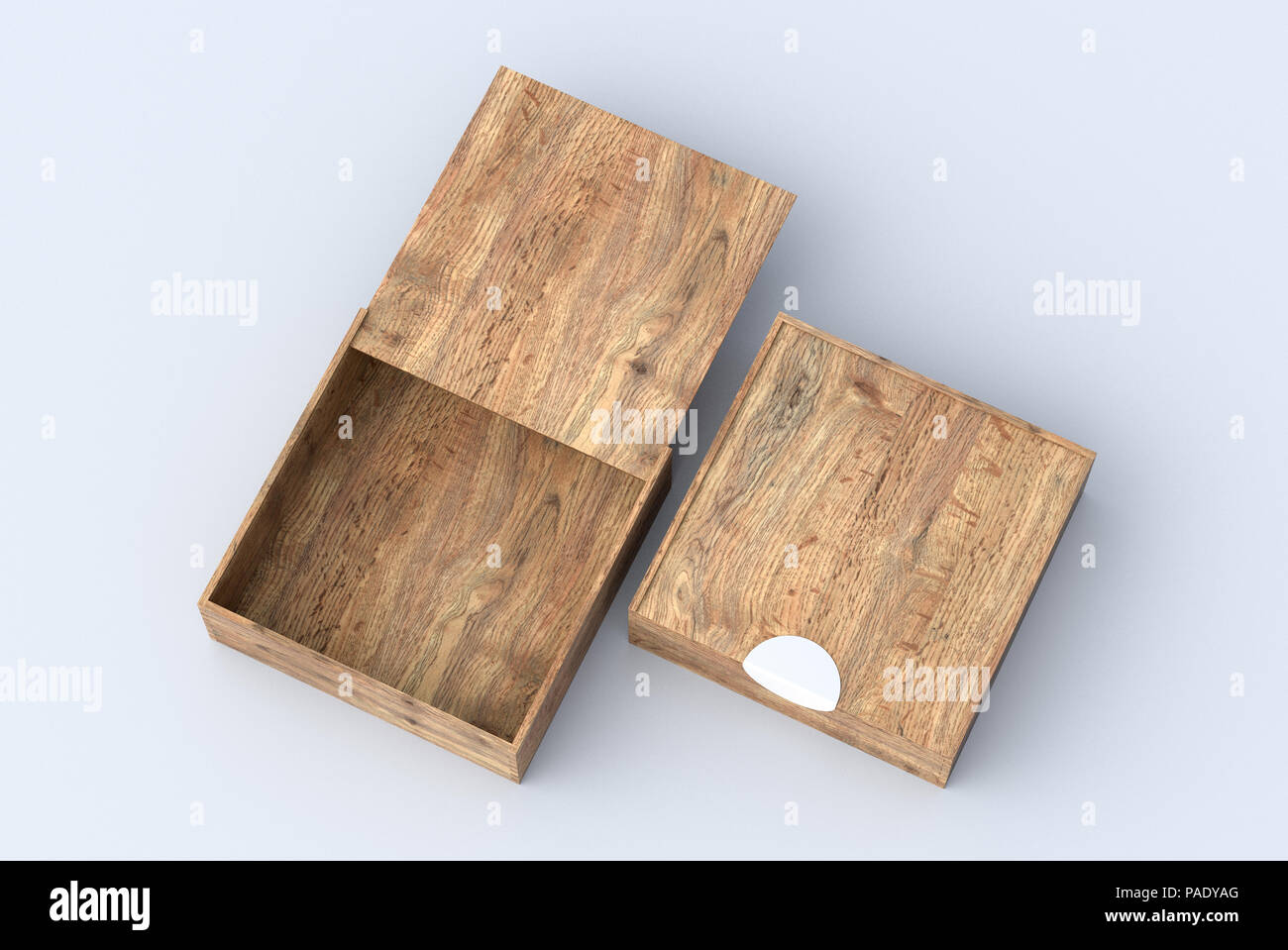 Two wooden square boxes with sliding lid on white background. Empty ...