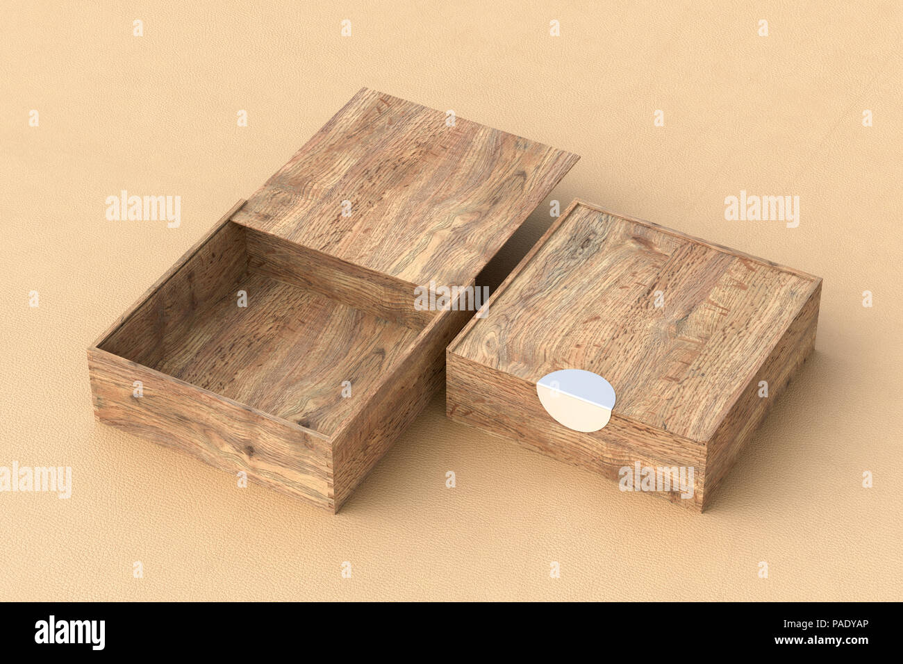 Two wooden square boxes with sliding lid on beige leather background ...