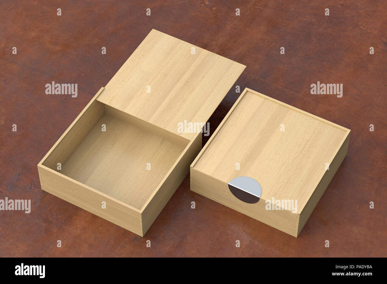 Two light wooden square boxes with sliding lid on brown leather ...