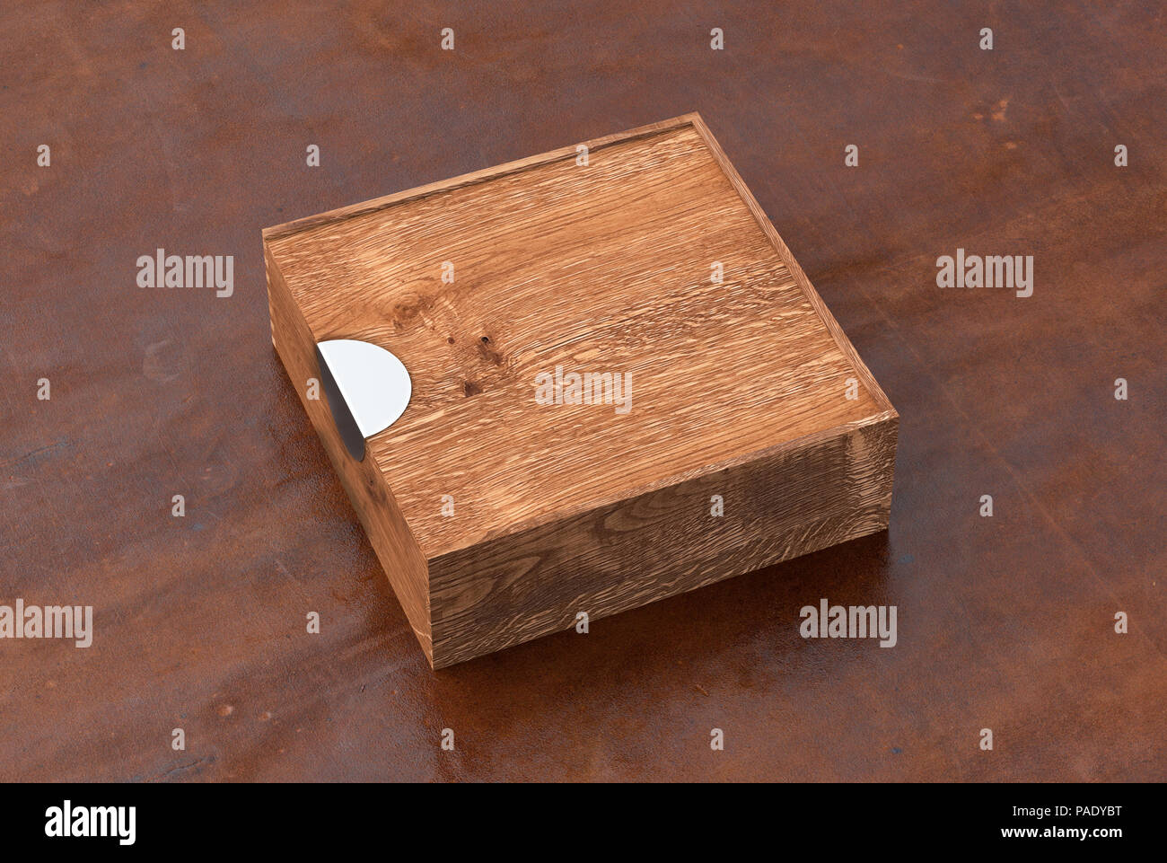 Blank dark wooden square box with closed sliding lid on brown leather ...
