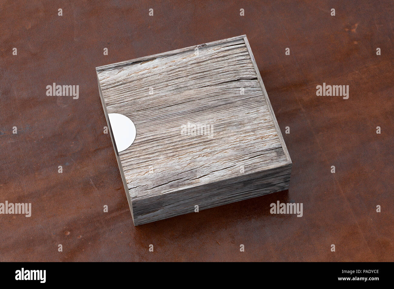 Blank vintage wooden square box with closed sliding lid on brown ...