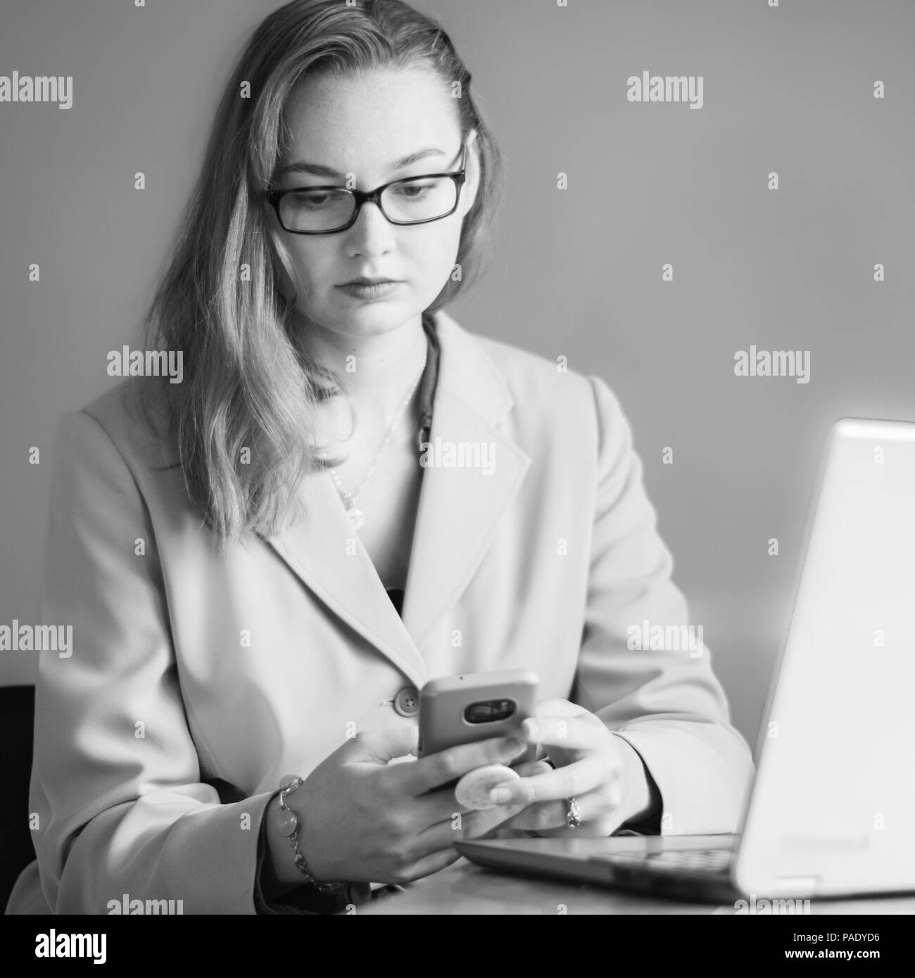 Young professional woman in office Black and White Stock Photos ...
