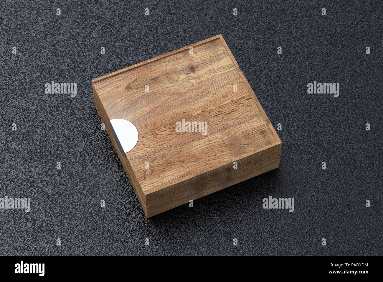 Blank wooden square box with closed sliding lid on black leather ...