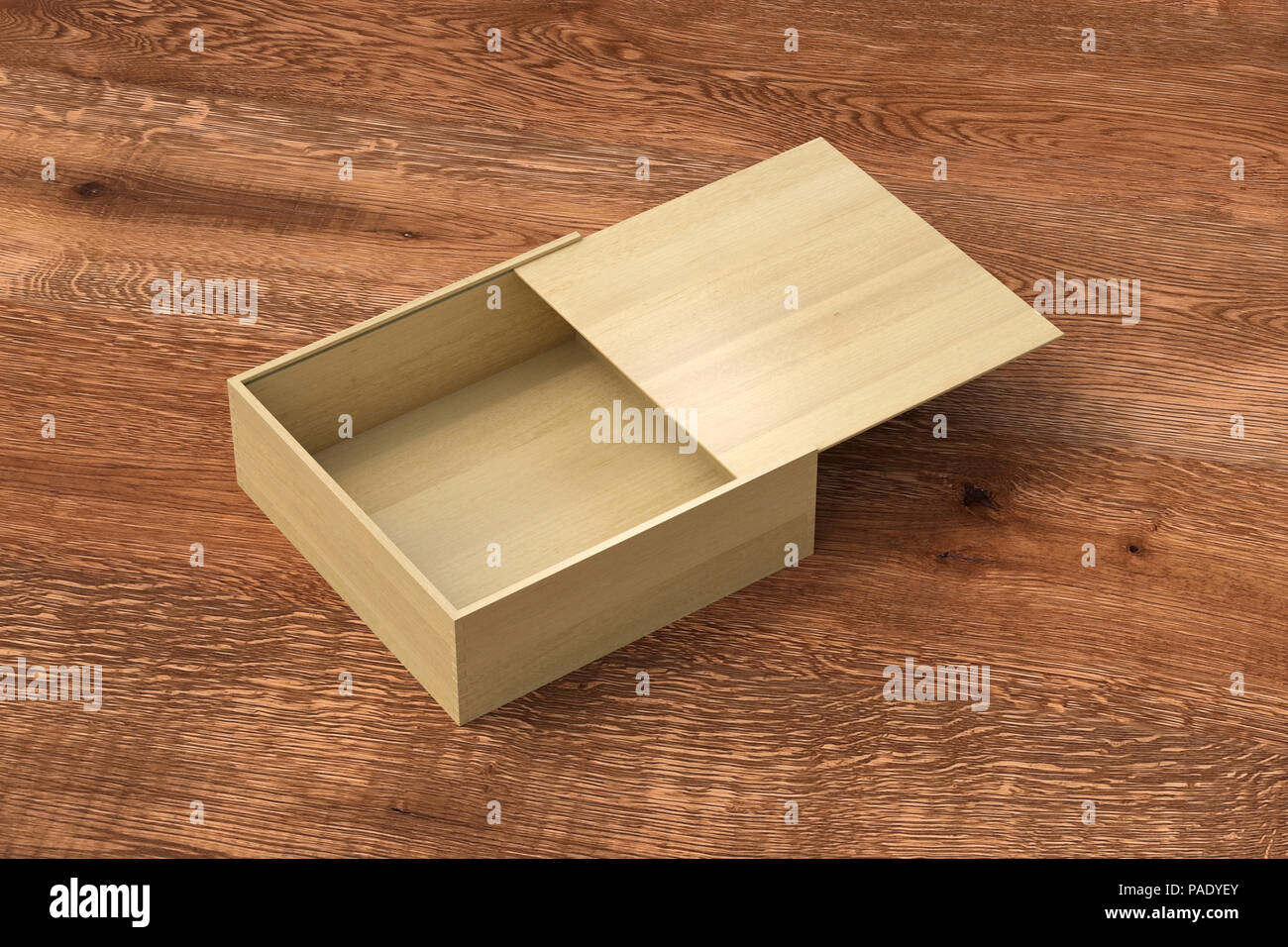 Empty light wooden square box with opened sliding lid on dark wooden ...