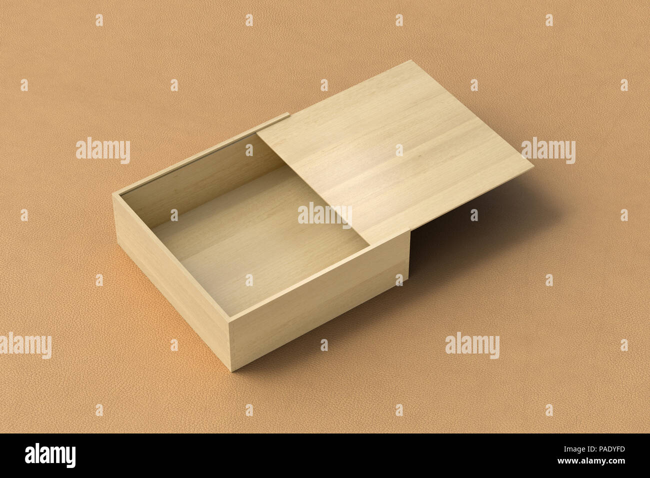 Empty light wooden square box with opened sliding lid on beige leather ...