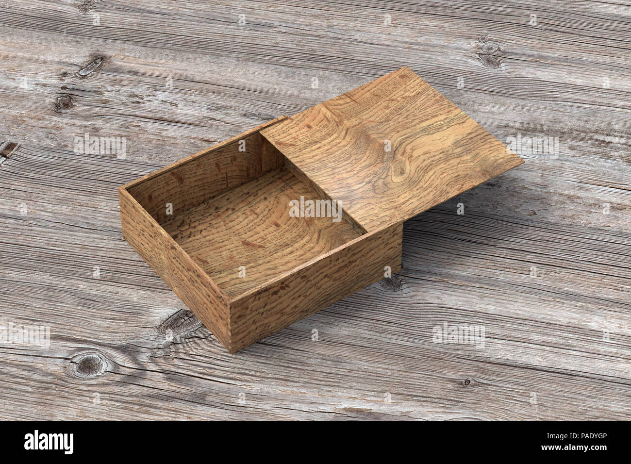 Empty wooden square box with opened sliding lid on old wooden ...