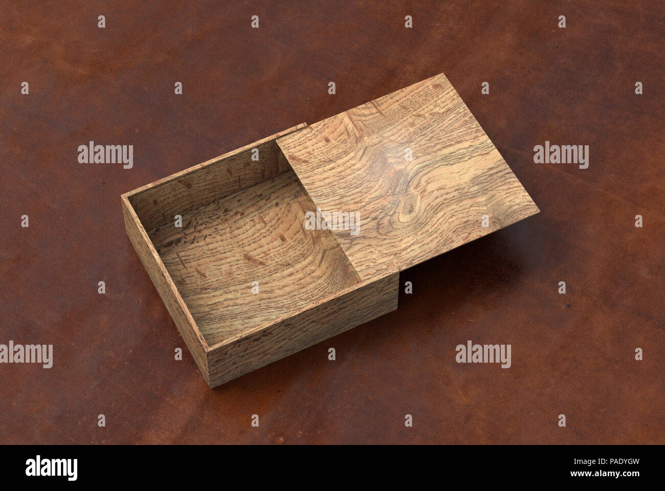 Empty wooden square box with opened sliding lid on brown leather ...